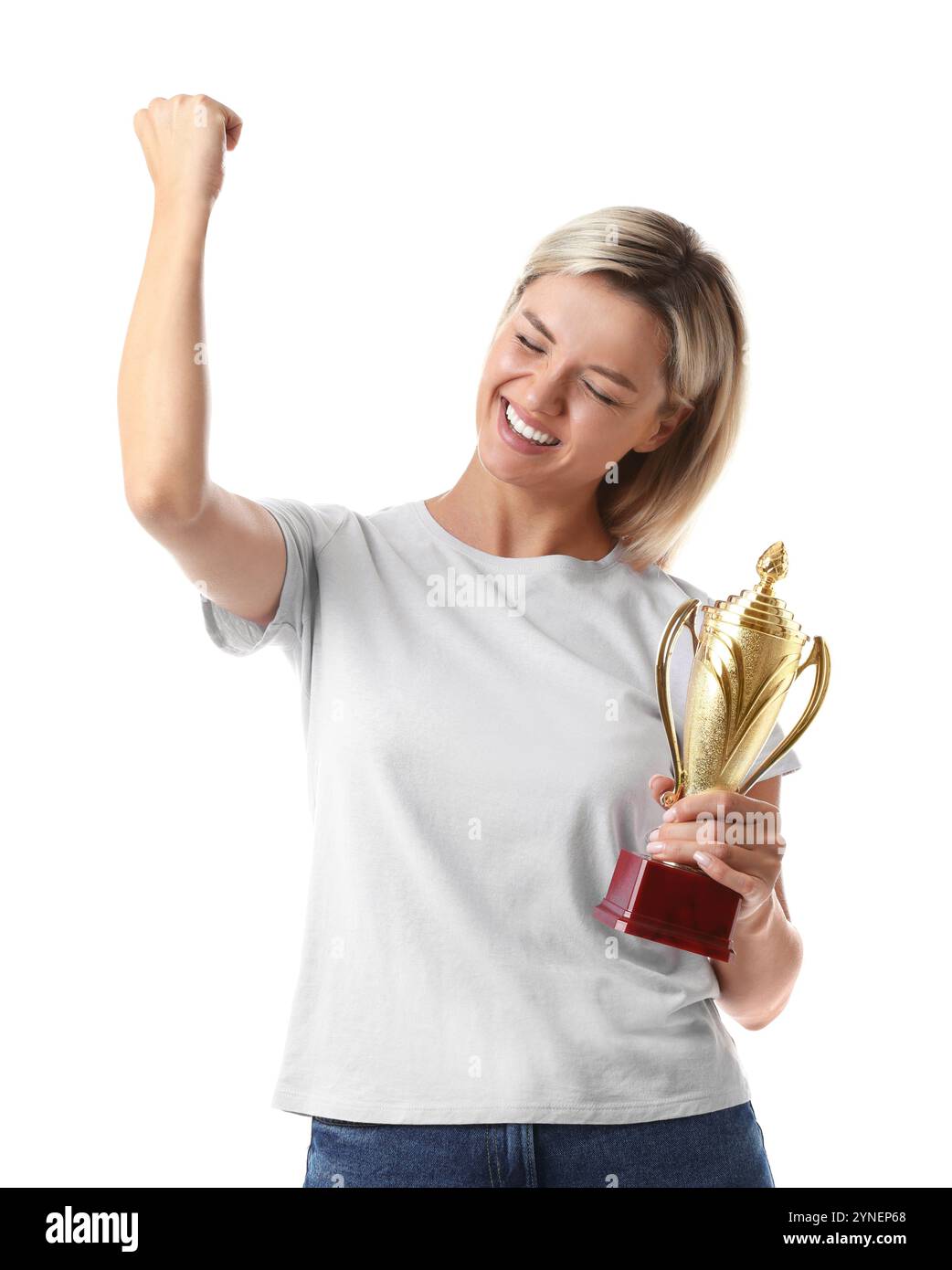 Happy winner with golden trophy cup on white background Stock Photo - Alamy