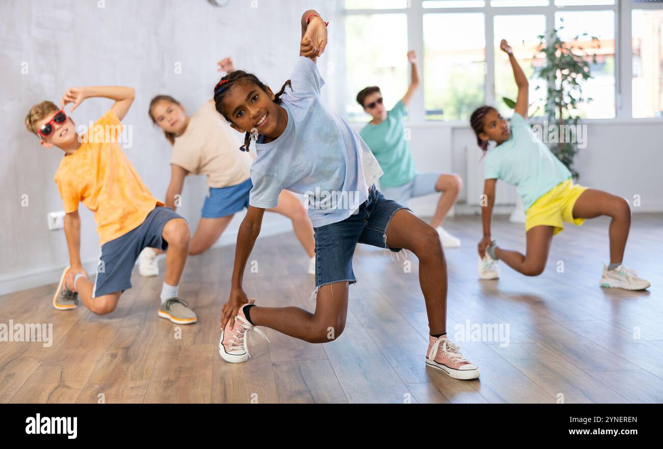Dark-skinned preteen boy krumper dancing in choreographic studio Stock ...