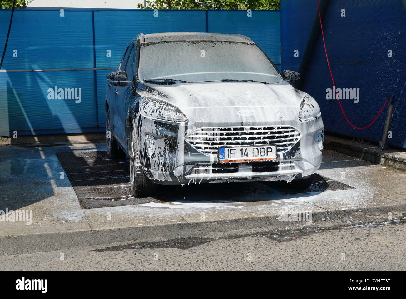Carwash service car covered hi-res stock photography and images - Alamy