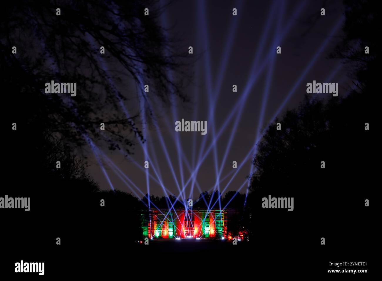 Powerful spotlights shine into the sky from the Northern Lights event ...