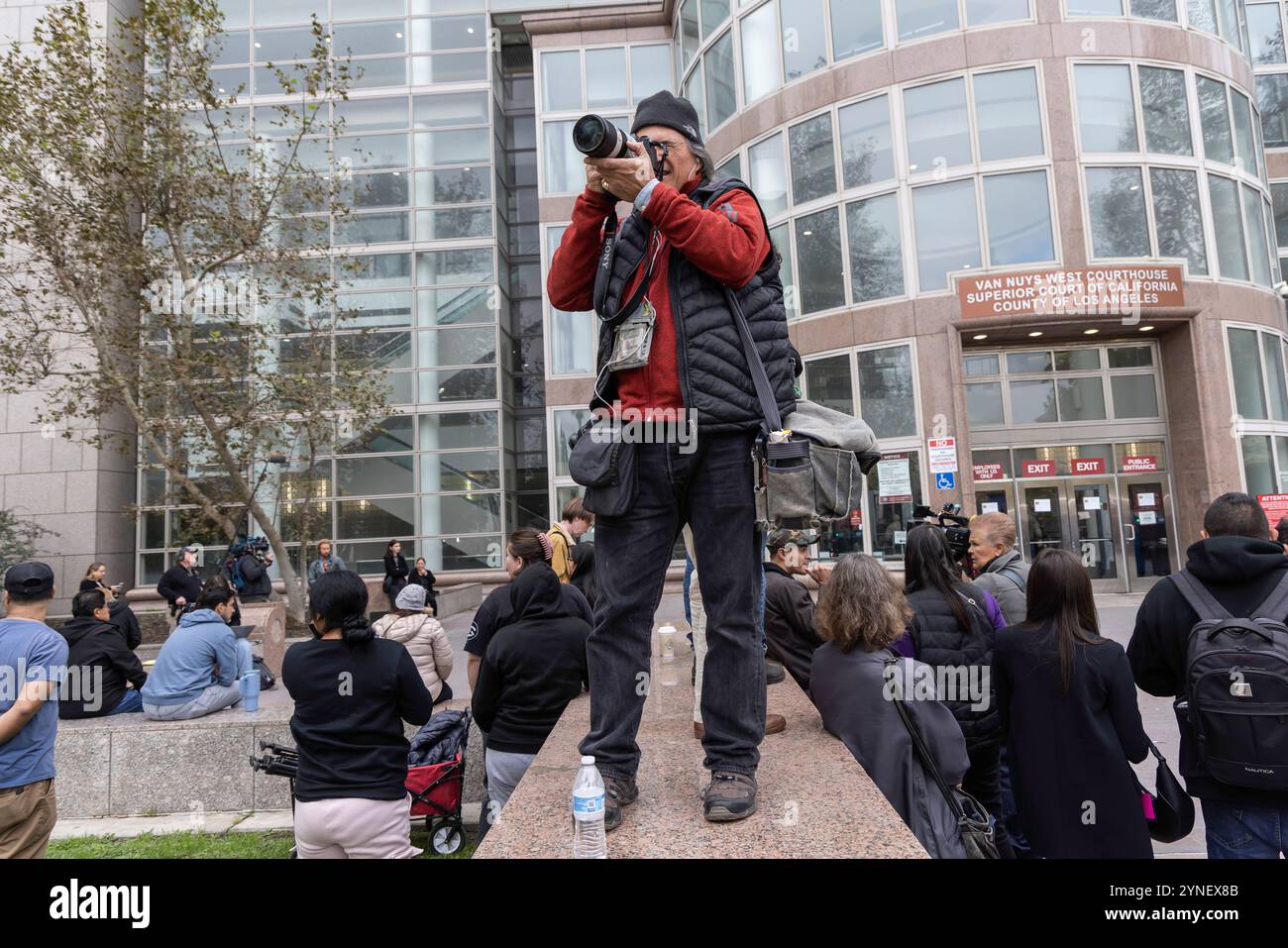 Court watchers and media members outside of the Van Nuys Courthouse ...