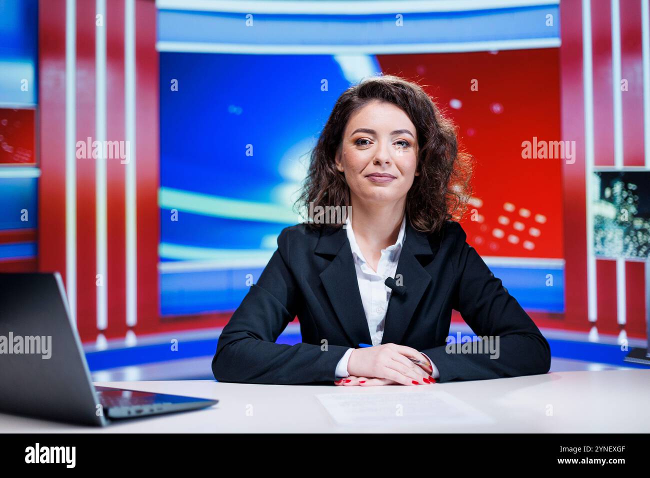 News anchor broadcasting live events in newsroom for television channel ...