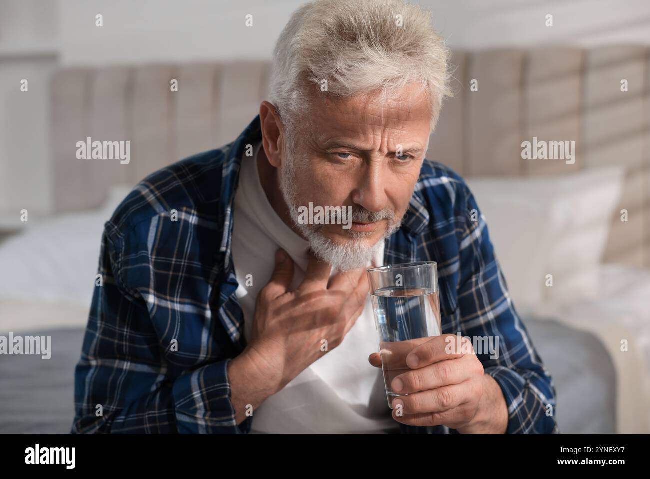 Suffering from heartache disease at home hi-res stock photography and ...