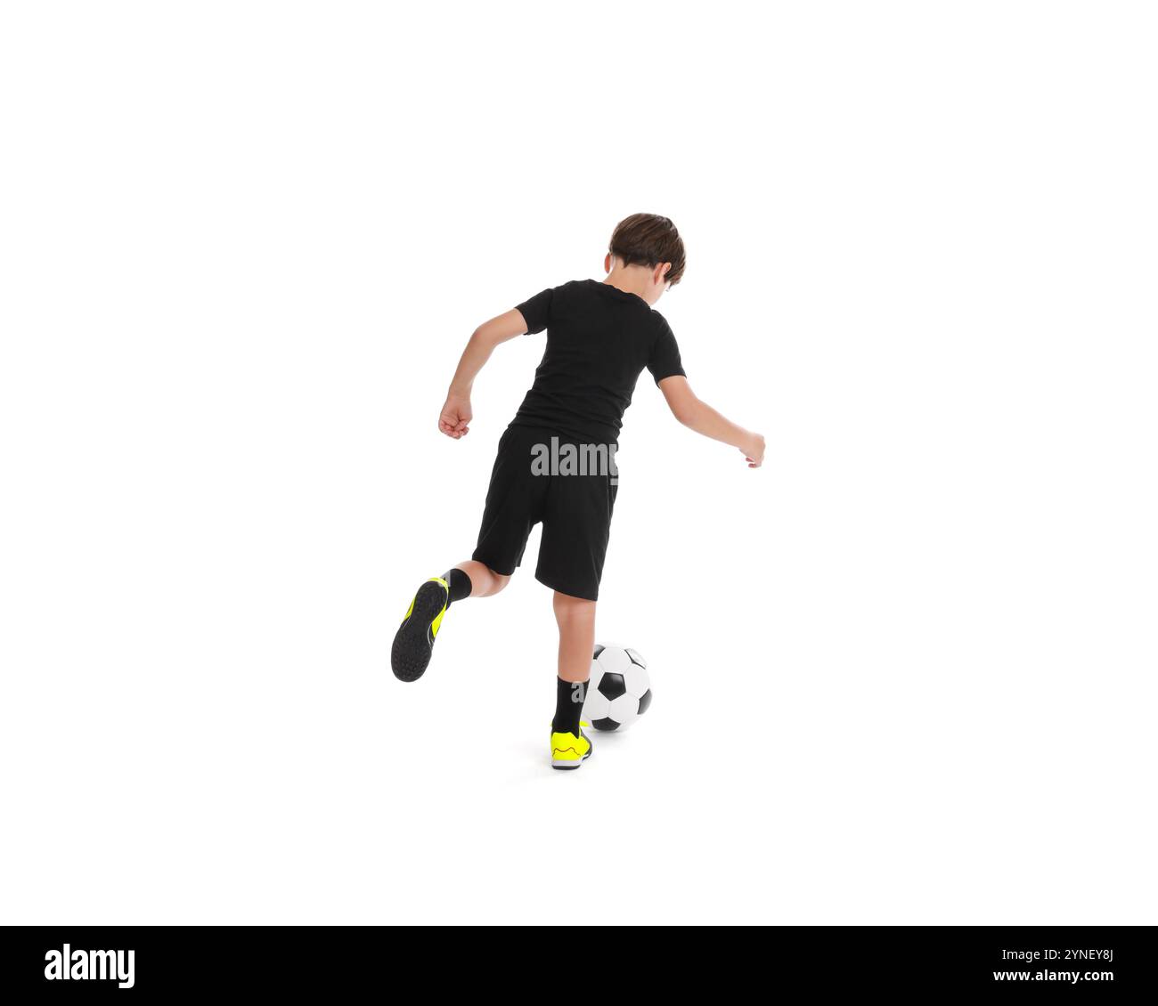 Boy with soccer ball playing football on white background, back view ...