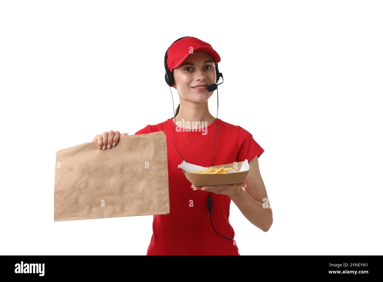 Fast-food worker with paper bag and fries on white background Stock ...