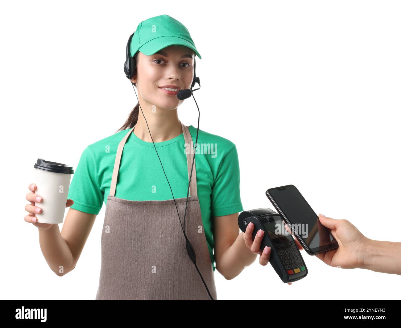 Fast-food worker taking payment from client via terminal on white ...