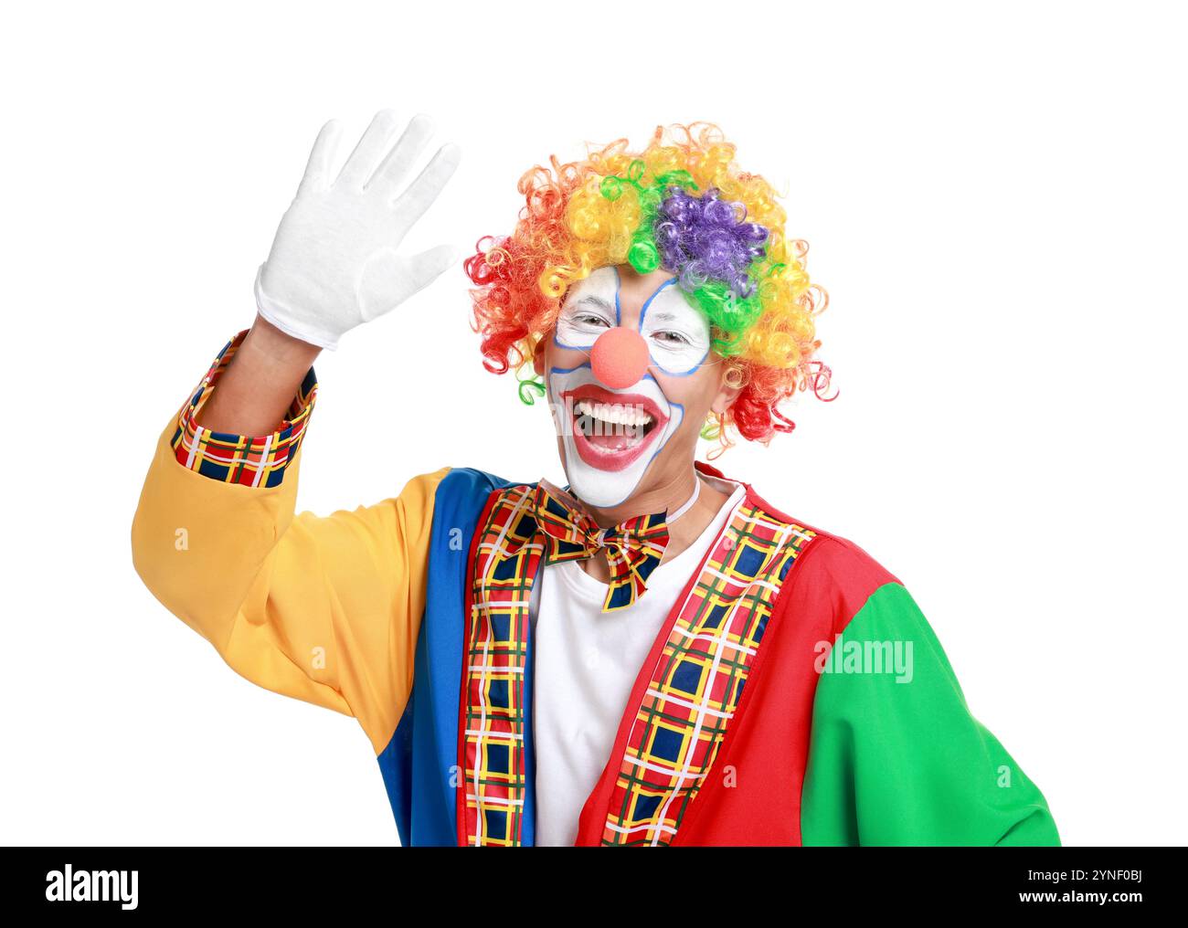 Portrait of happy clown waving on white background Stock Photo - Alamy