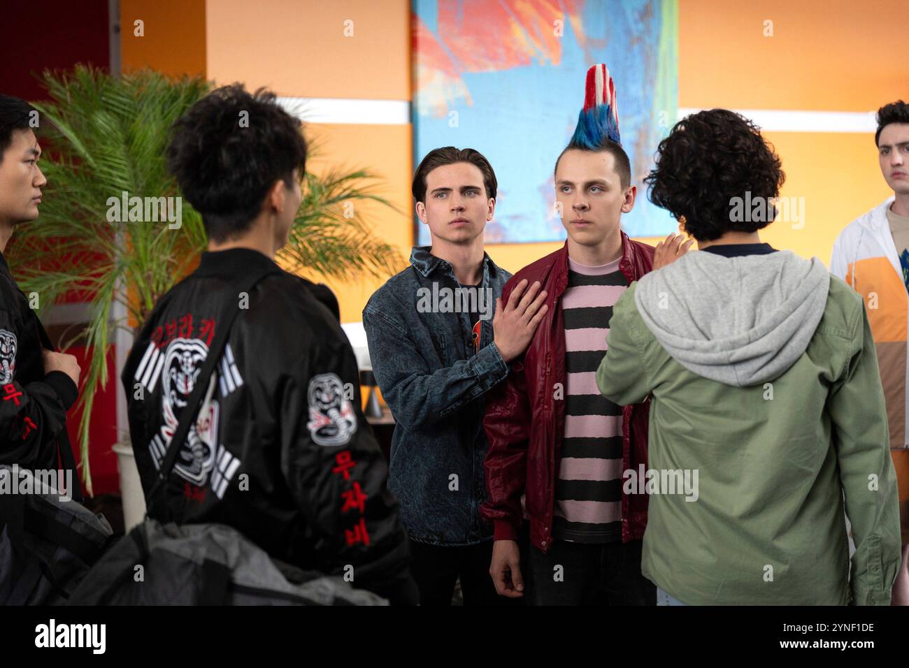 COBRA KAI, from left: Brandon H. Lee, Tanner Buchanan, Jacob Bertrand ...