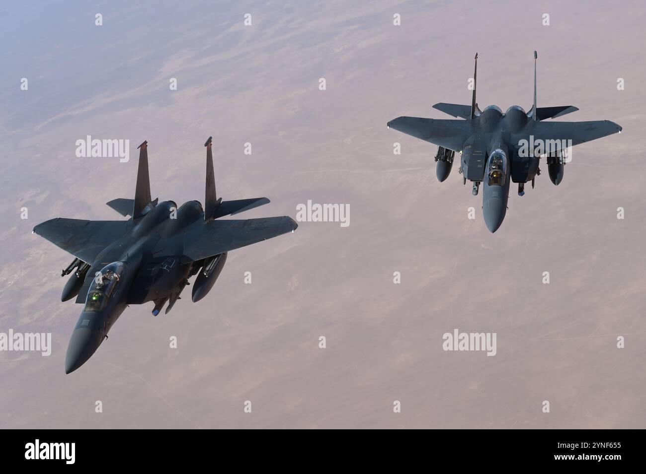 Two U.S. Air Force F-15E Strike Eagles conduct a combat air patrol in support of Operation ...