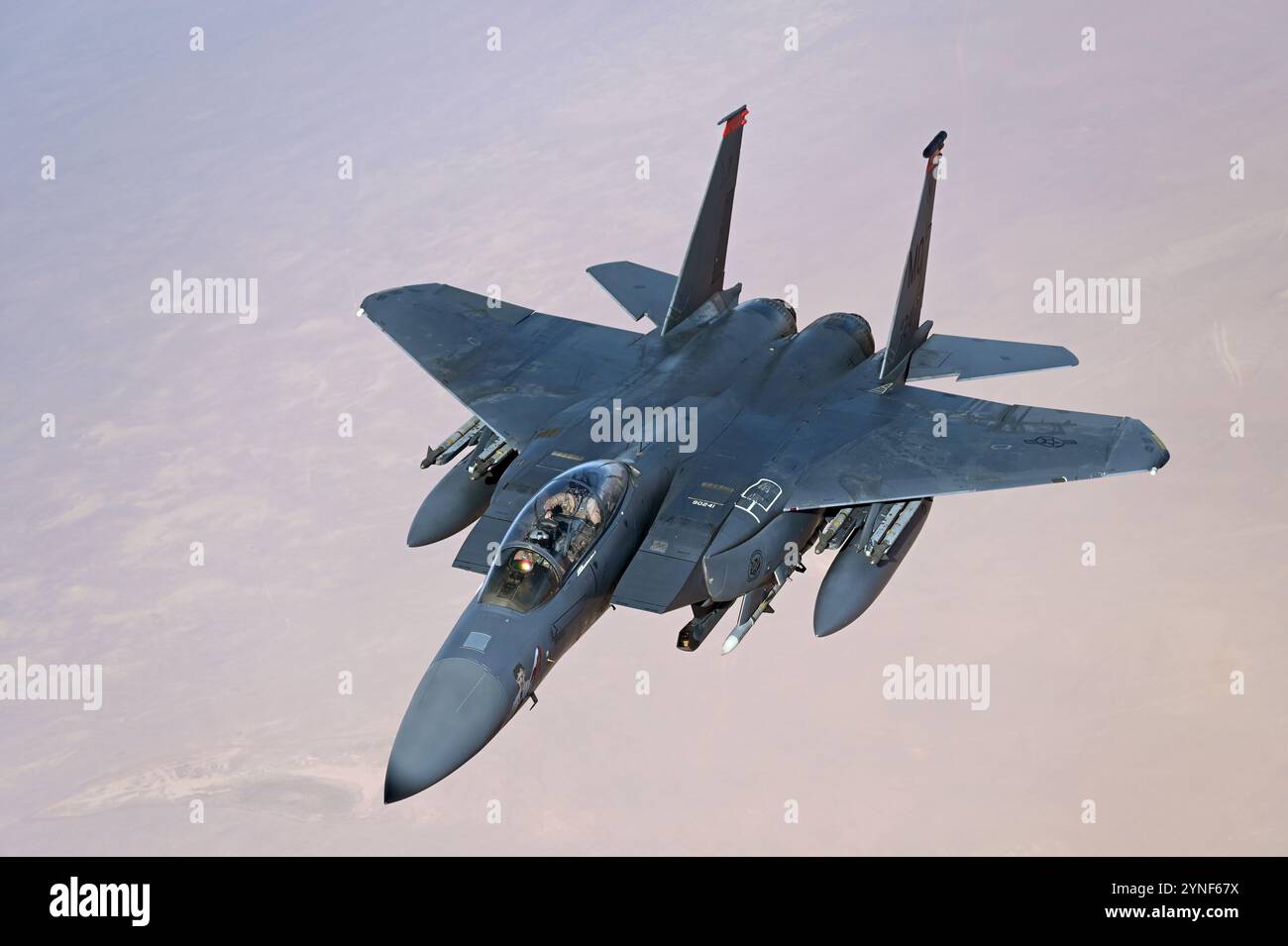 A U.S. Air Force F-15E Strike Eagle conducts a combat air patrol in support of Operation ...