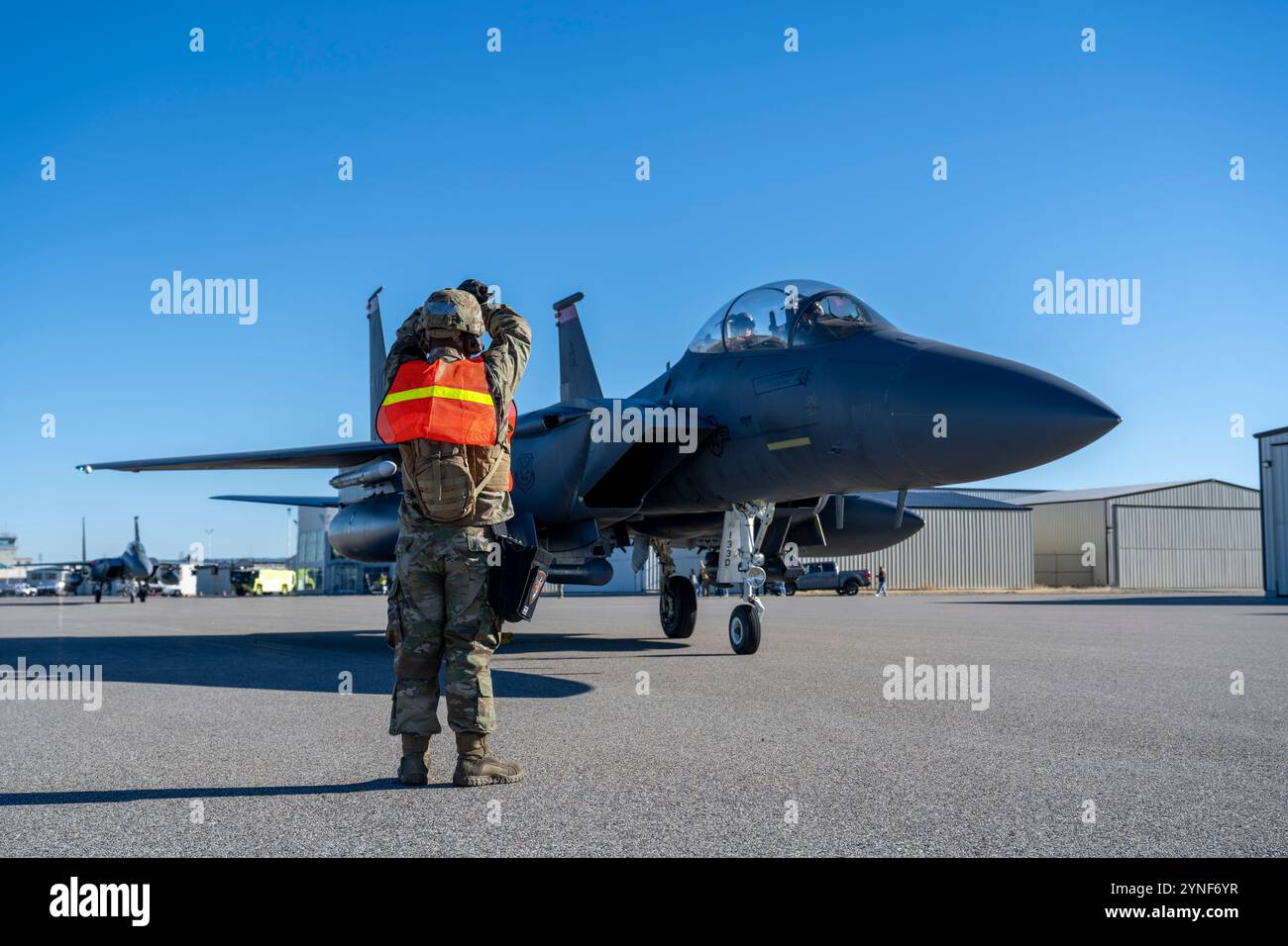 U.S. Air Force Senior Airman James Cooper, a weapons load crew chief ...