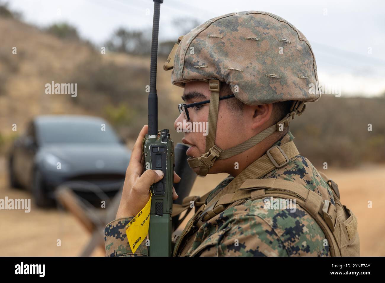 A U.S. Marine with Marine Wing Communications Squadron 38, Marine Air ...