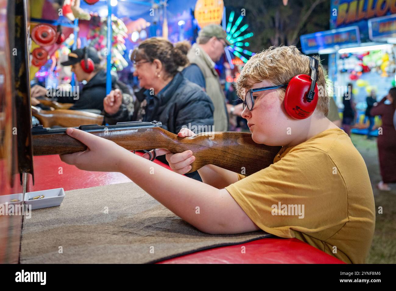 Bundaberg Queensland Australia - May 30 2024: boy shooting rifle at ...