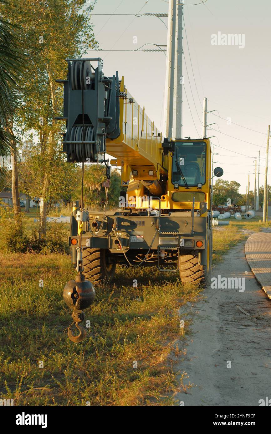 Wide Front View ROUGH TERRAIN CRANE with crane ball hook hanging, black ...