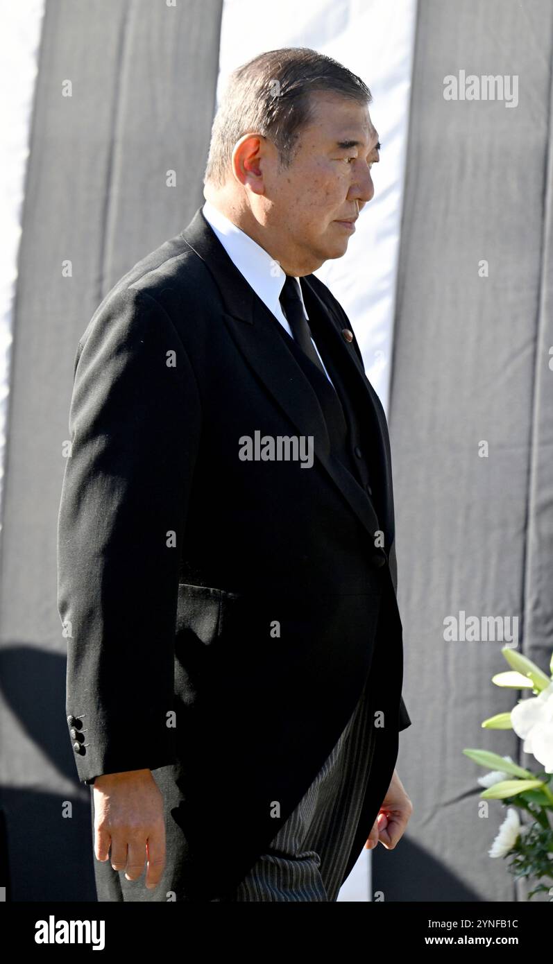 Japanese Prime Minister Shigeru Ishiba arrives at Toshimagaoka Cemetery ...