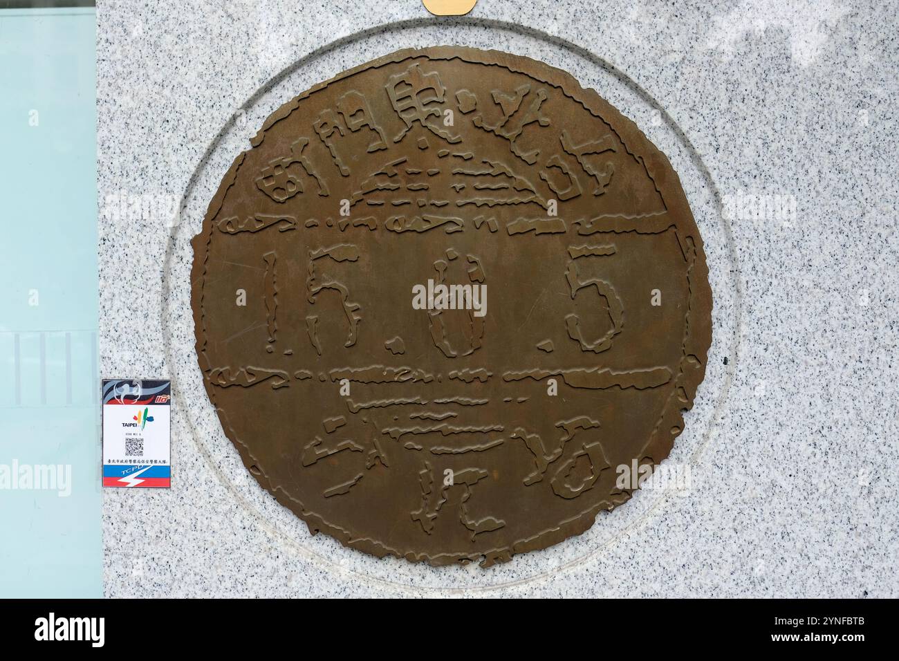 Bronze replica of the original post mark commemorating the location of ...