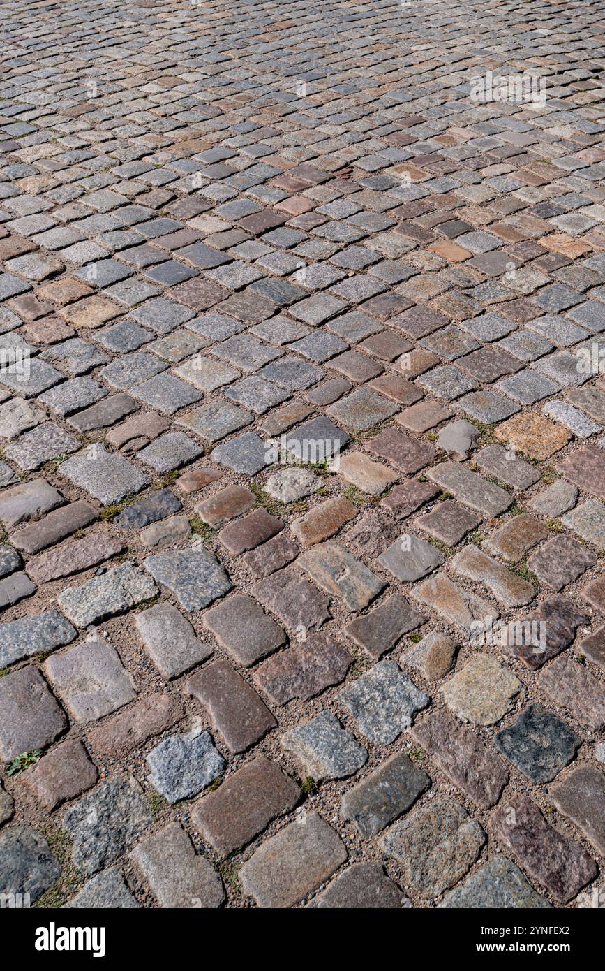Background of bricks road. Background with bricks road. Stone cladding ...