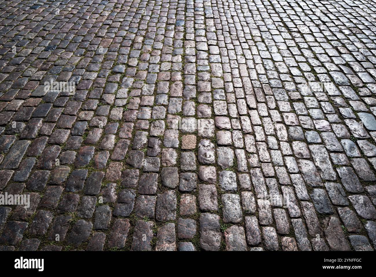 Stone road. Pavement texture. Stonework background for design. Granite cobblestoned pavement ...