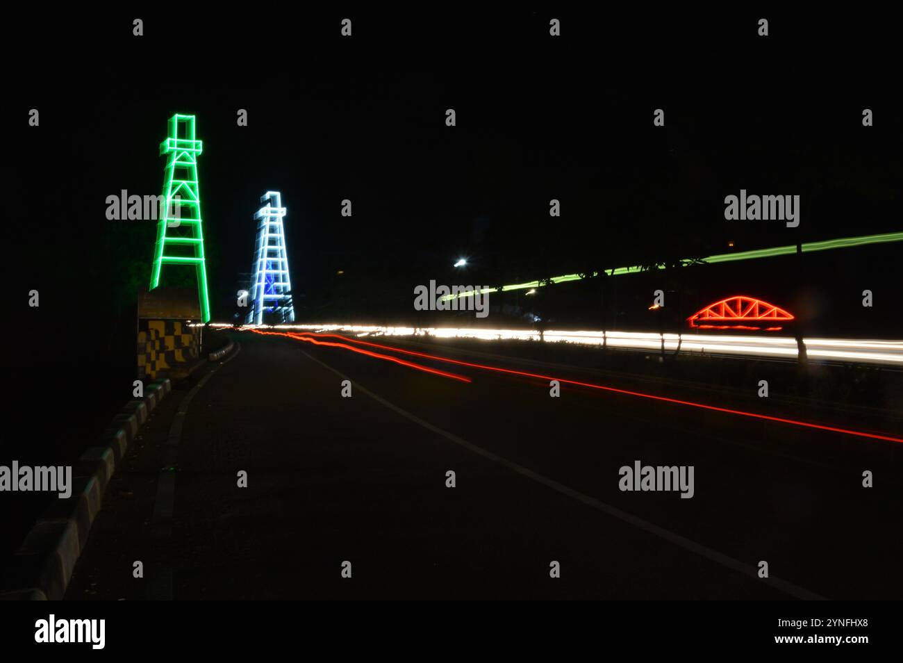 the atmosphere of the night on Tarakan City with old oil tower ...