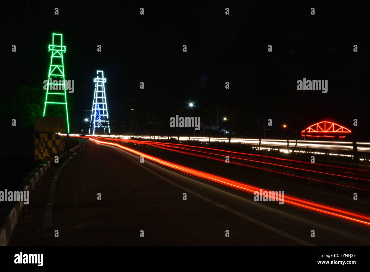 the atmosphere of the night on Tarakan City with old oil tower ...