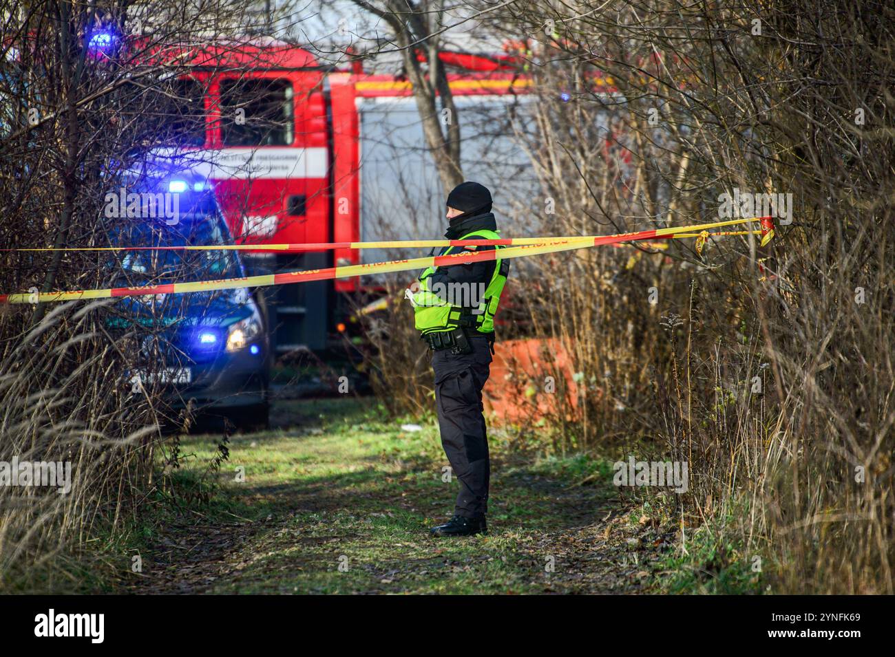 Police officers are seen near the site of the Swiftair cargo plane ...