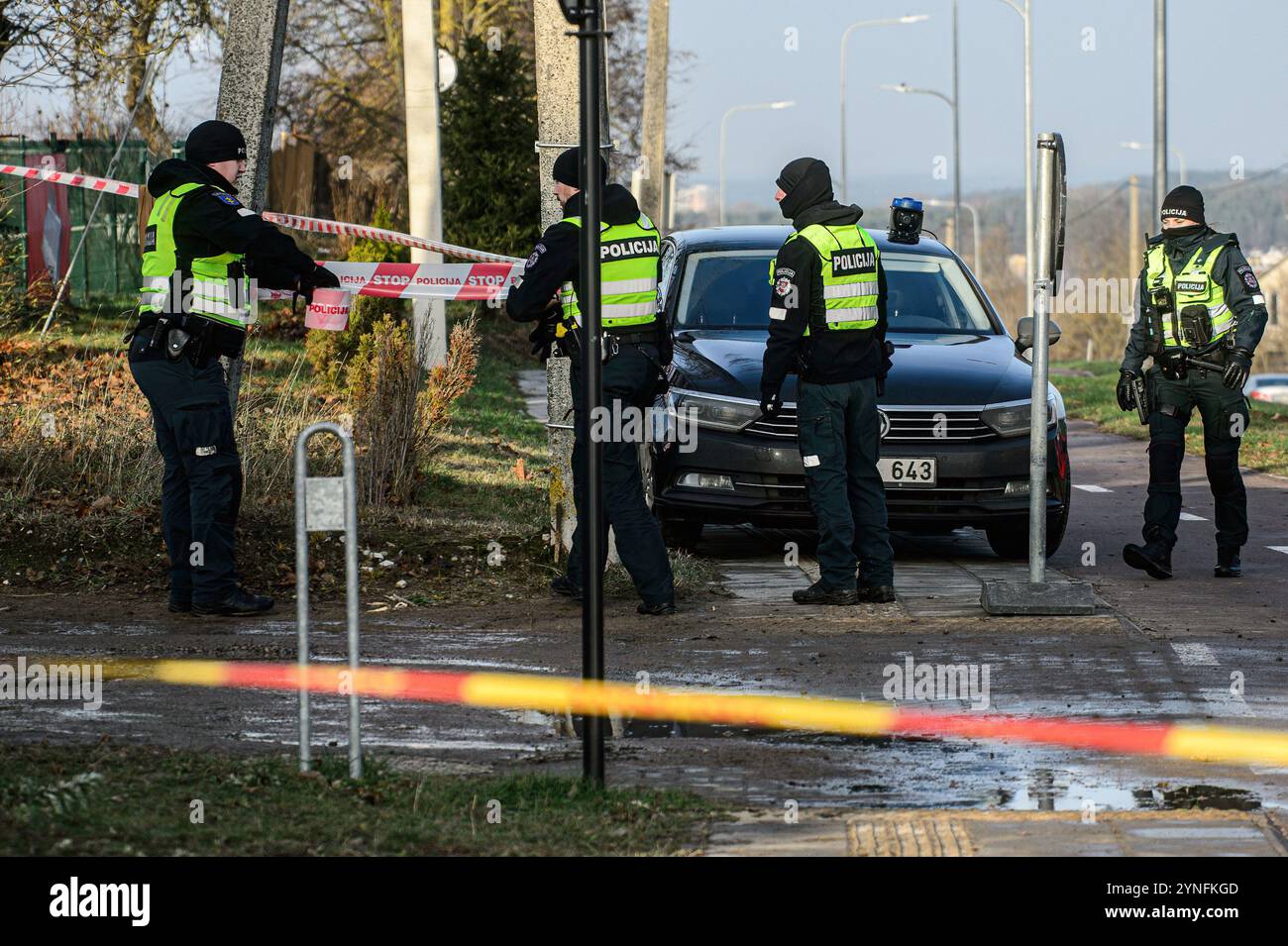 Police officers are seen near the site of the Swiftair cargo plane ...