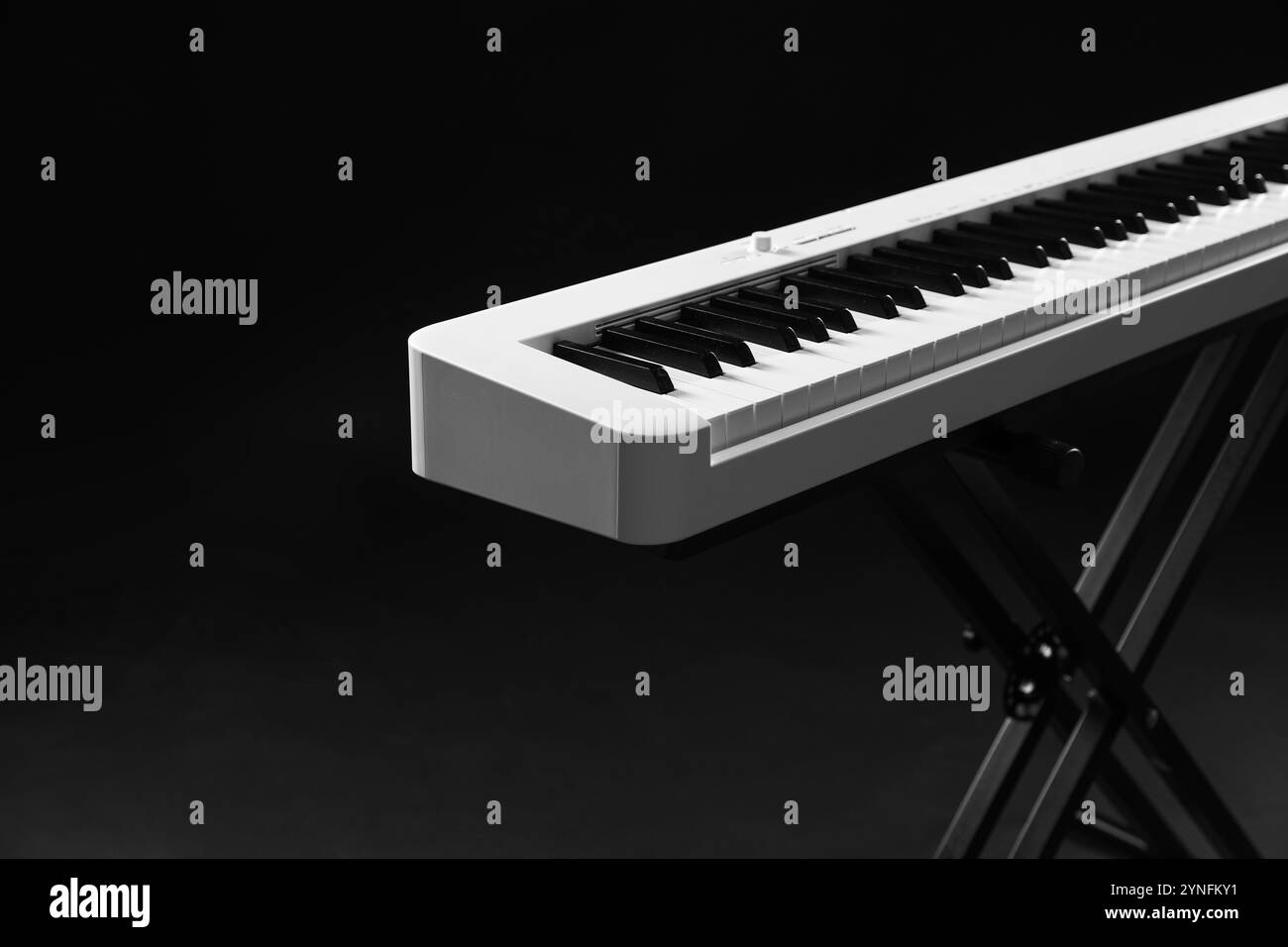Synthesizer on black background, closeup. Electronic musical instrument ...
