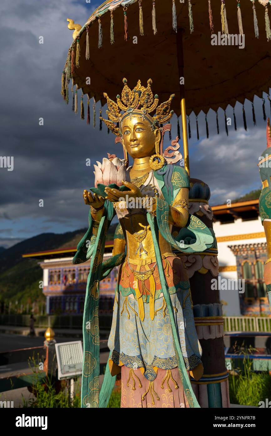 Golden female god statue at the roundabout in Thimphu, Bhutan Stock ...