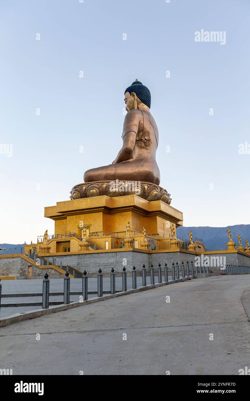 Buddha Dordenma, a large golden buddha statue sitting on the top of a ...