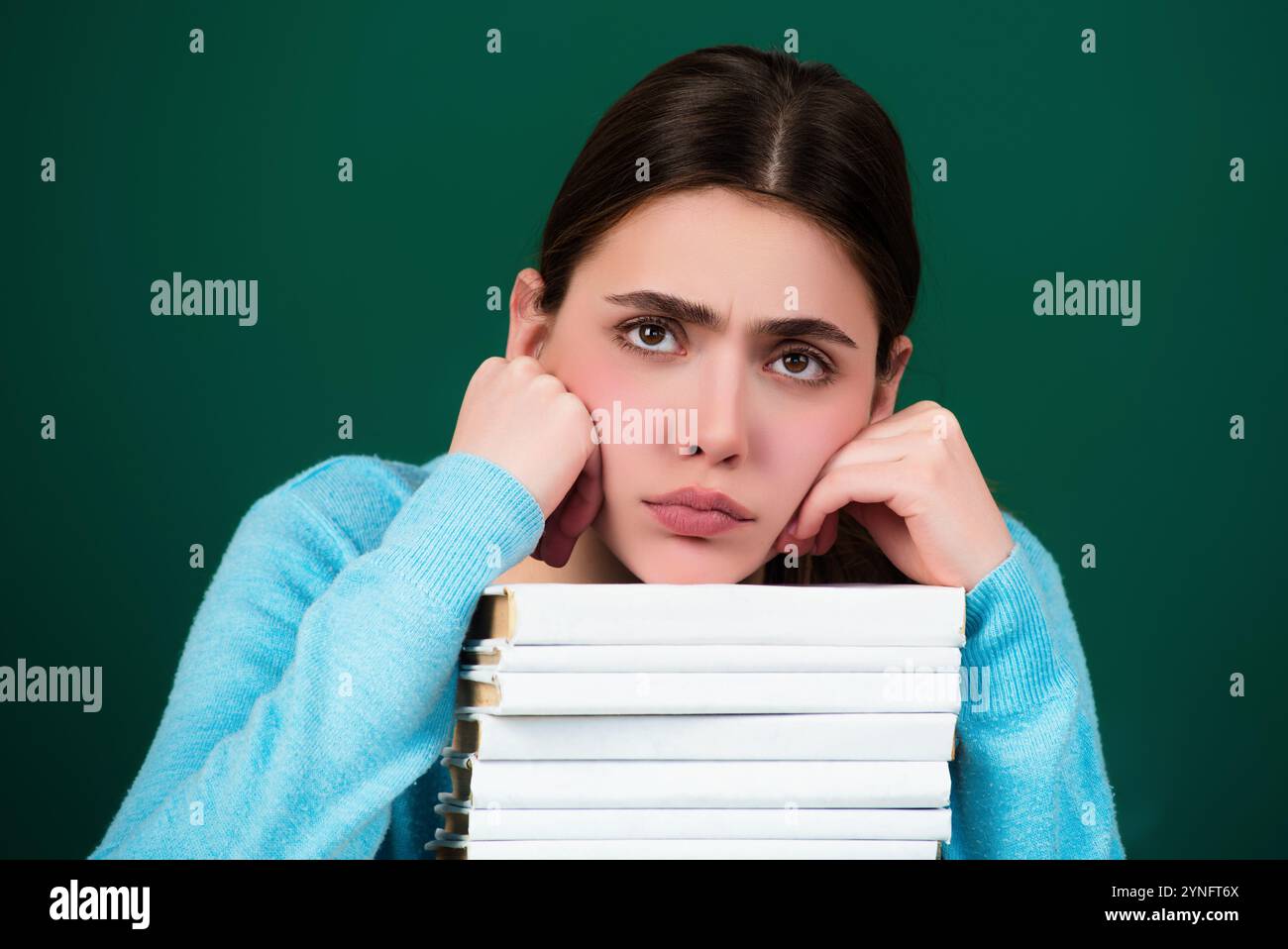 Sad college student. Tired school girl. Tired student having too much ...