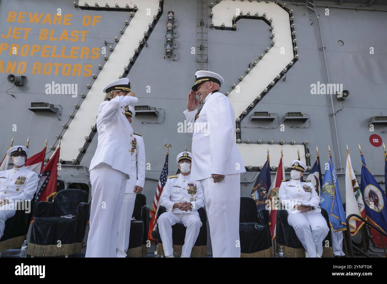 Capt. Amy Bauernschmidt, left, assumes command of USS Abraham Lincoln ...