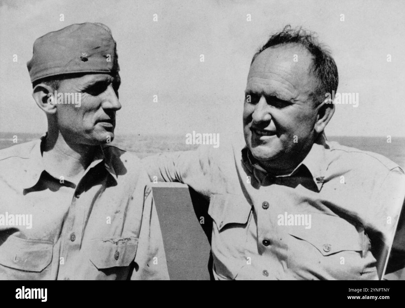 Captain Dixie Kiefer and Commander William O. Burch aboard USS ...