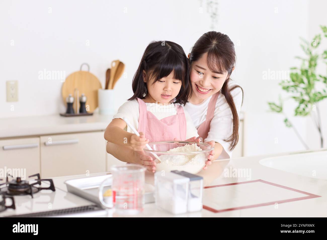 Japanese mother and daughter cooking together Stock Photo - Alamy