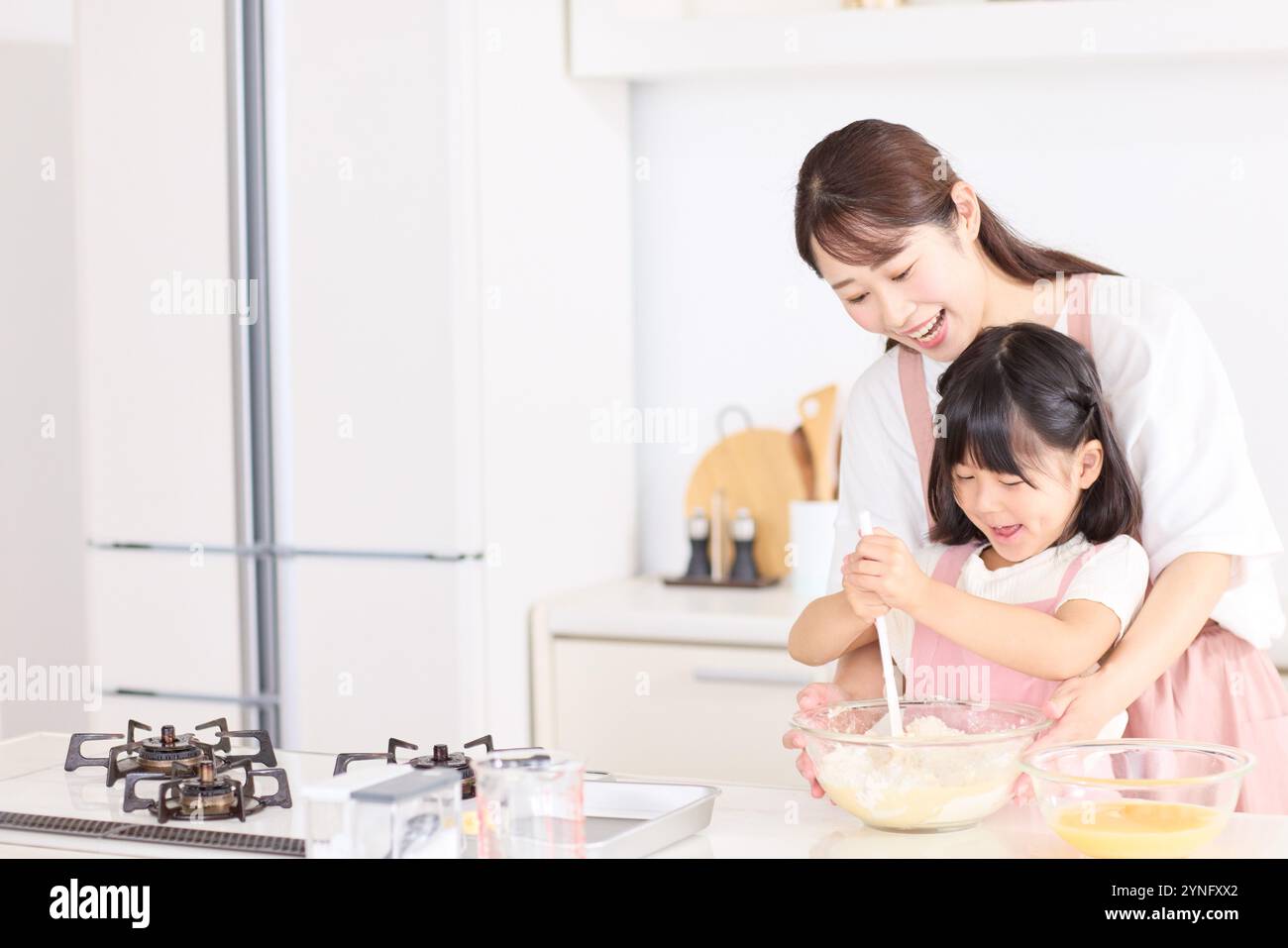 Japanese mother and daughter cooking together Stock Photo - Alamy