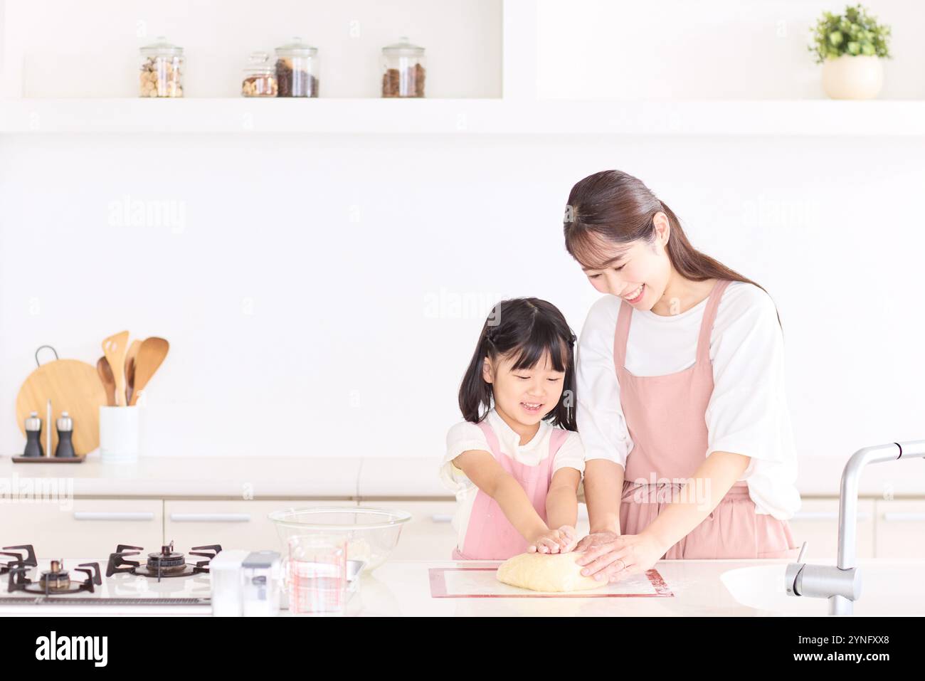 Japanese mother and daughter cooking together Stock Photo - Alamy