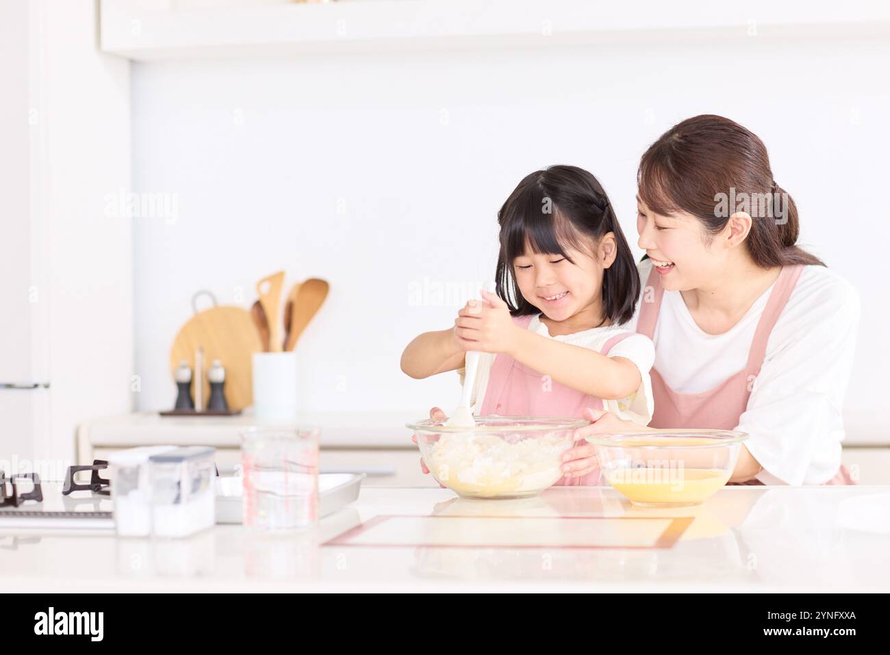 Japanese mother and daughter cooking together Stock Photo - Alamy