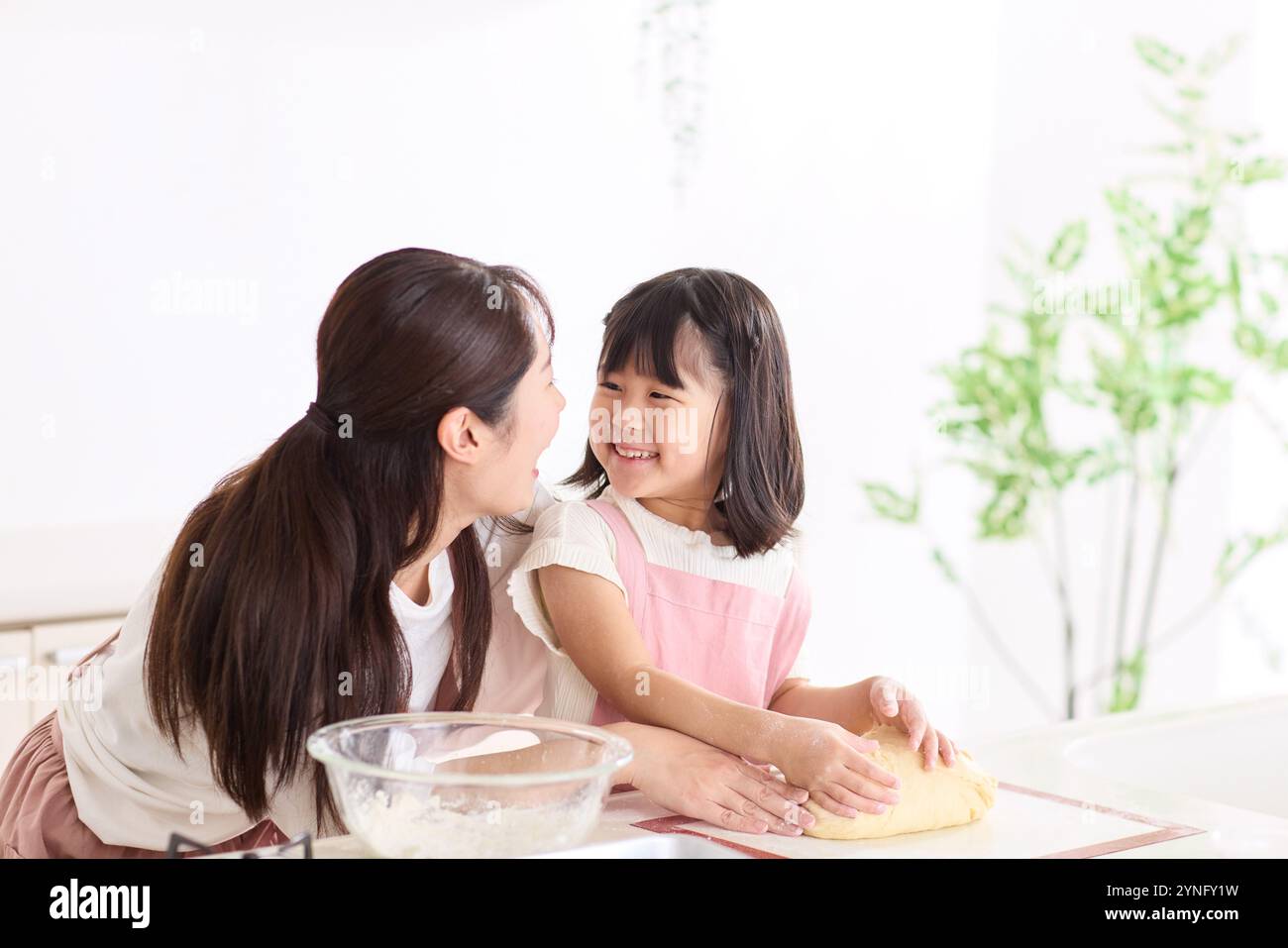 Japanese mother and daughter cooking together Stock Photo - Alamy