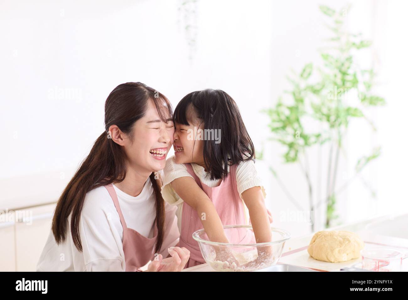 Japanese mother and daughter cooking together Stock Photo - Alamy
