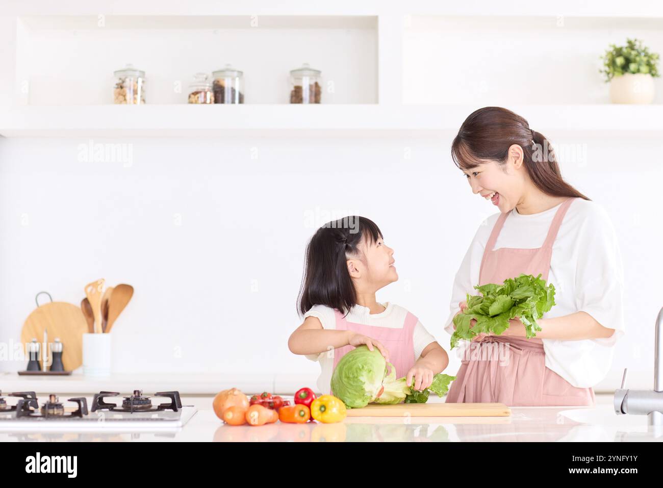 Japanese mother and daughter cooking together Stock Photo - Alamy