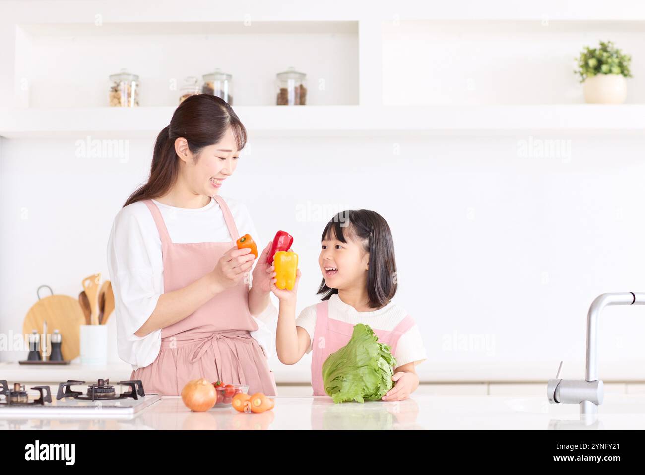 Japanese mother and daughter cooking together Stock Photo - Alamy