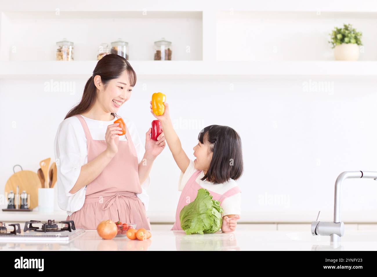 Japanese mother and daughter cooking together Stock Photo - Alamy