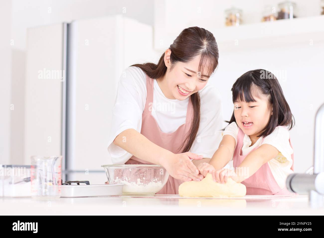 Japanese mother and daughter cooking together Stock Photo - Alamy