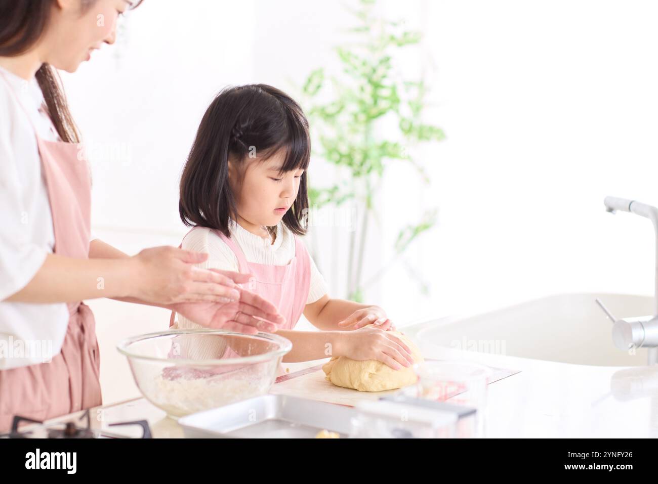 Japanese mother and daughter cooking together Stock Photo - Alamy