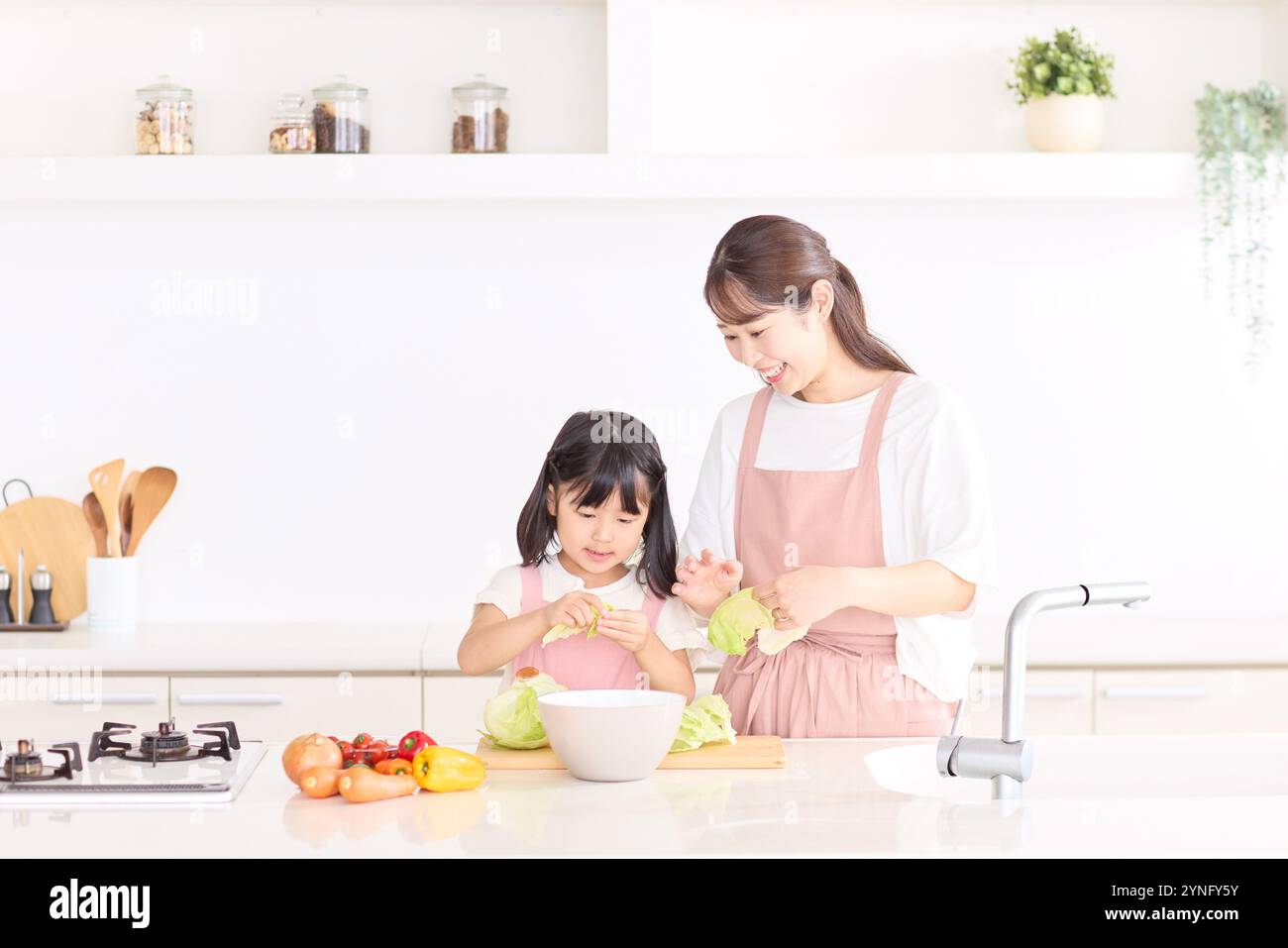 Japanese mother and daughter cooking together Stock Photo - Alamy
