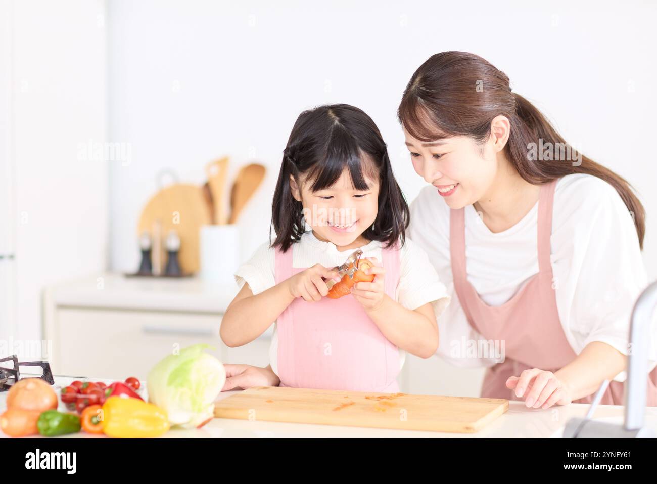 Japanese mother and daughter cooking together Stock Photo - Alamy