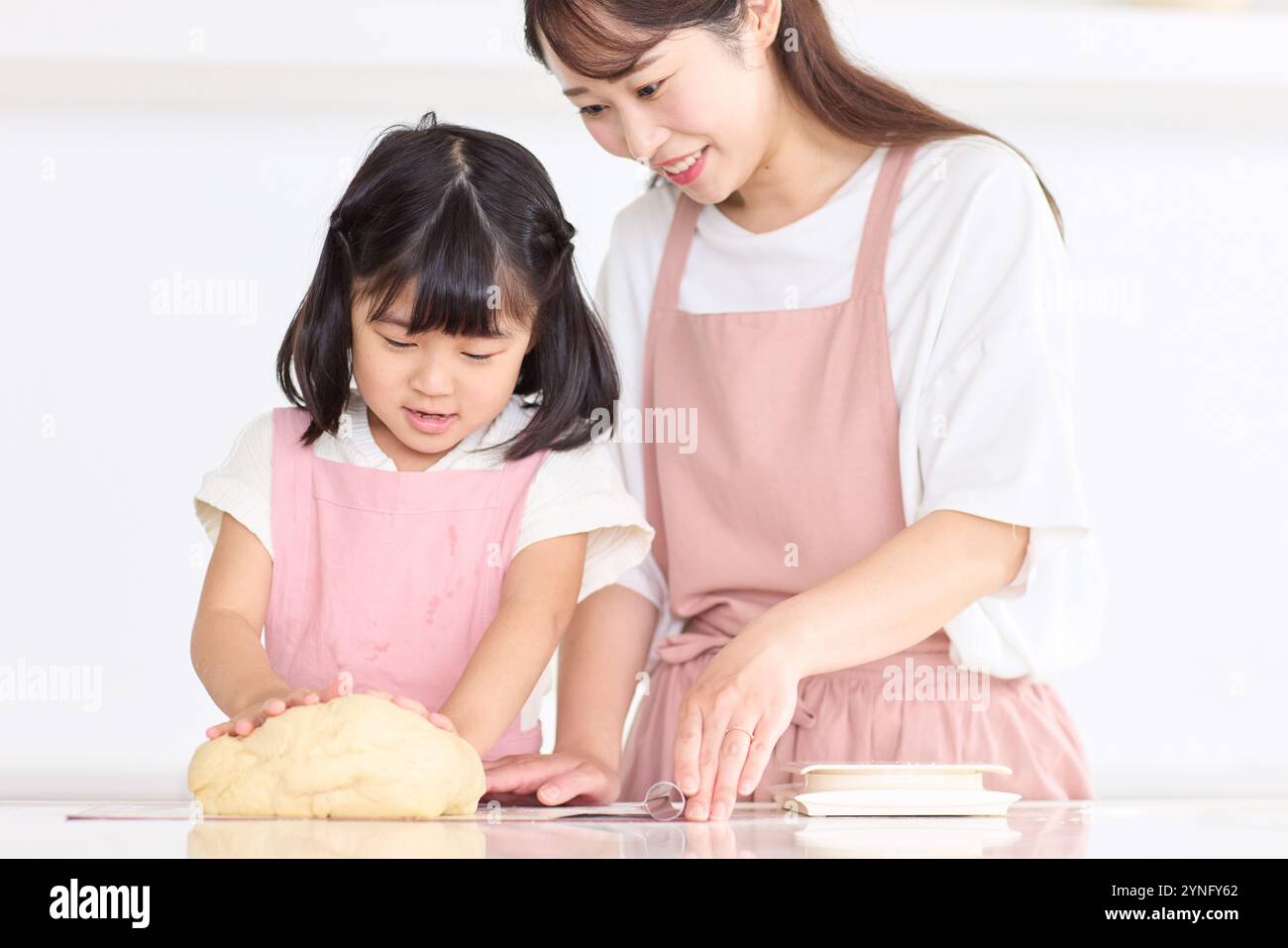 Japanese mother and daughter cooking together Stock Photo - Alamy