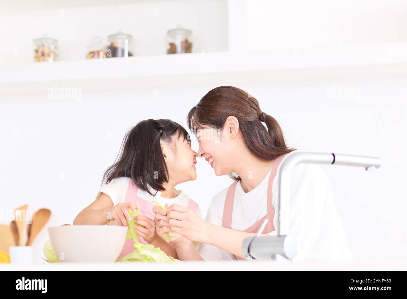 Japanese mother and daughter cooking together Stock Photo - Alamy