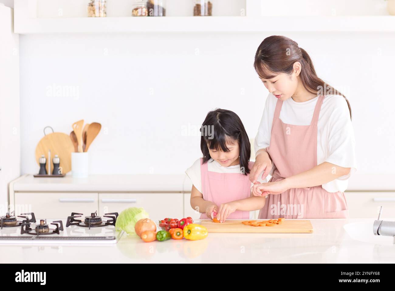Japanese mother and daughter cooking together Stock Photo - Alamy
