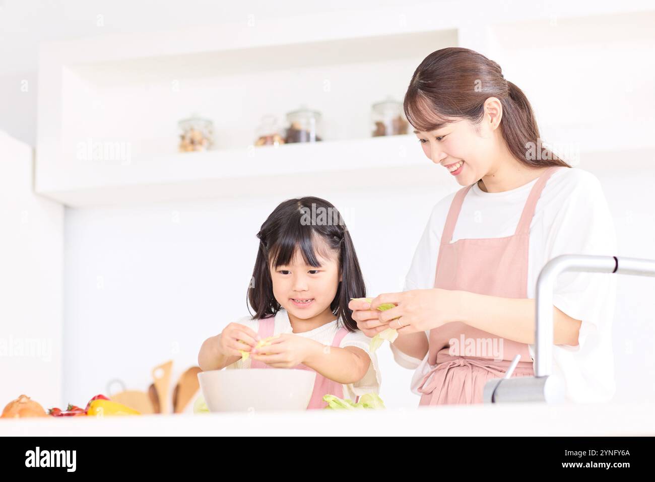 Japanese mother and daughter cooking together Stock Photo - Alamy