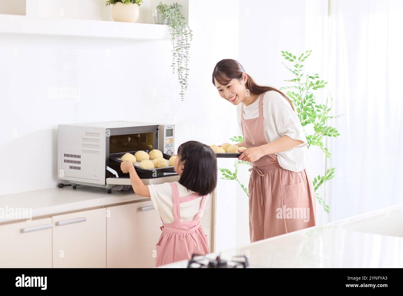 Japanese mother and daughter cooking together Stock Photo - Alamy